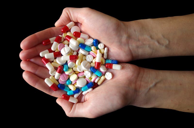 Handful of pills stock image. Image of black, capsules - 33854459