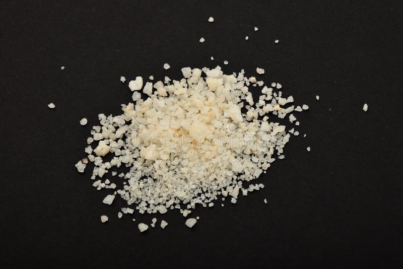 Peruvian Flakes And Crystals Of Pink Salt From Maras Region On A Black ...