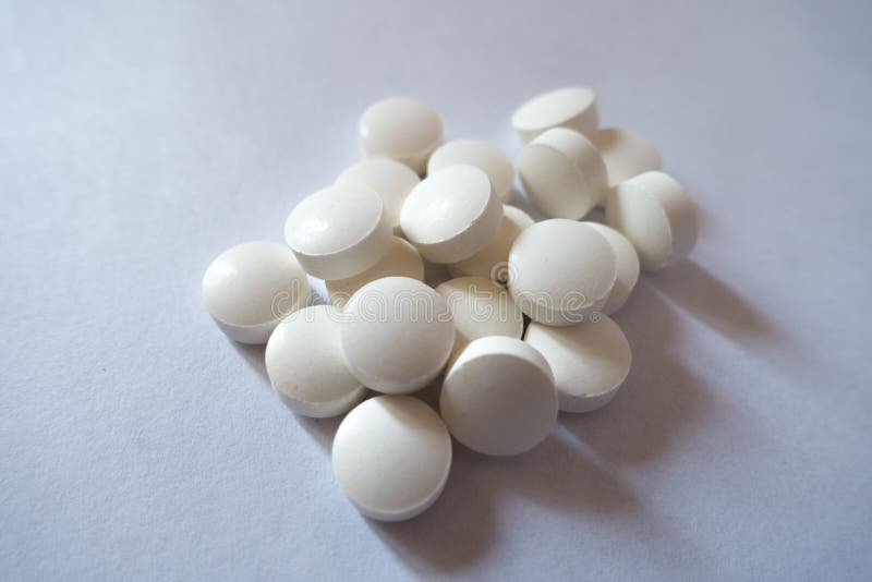 Handful of White Oral Probiotic Tablets Stock Photo - Image of ...