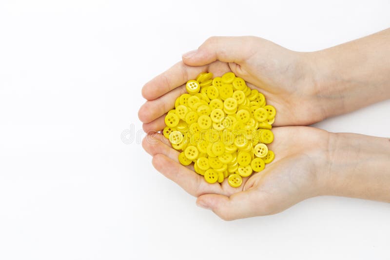 Handful of Yellow Buttonhole Buttons in the Hands Stock Illustration ...
