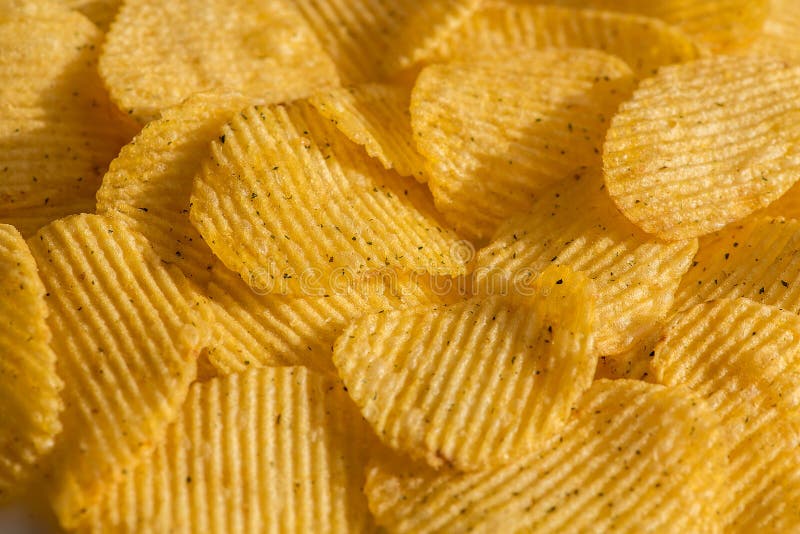 Handful of Yellow Potato Chips Stock Photo - Image of fast, crisps ...