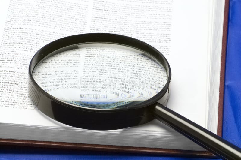 Handglass on a book stock photo. Image of glass, paper - 2770508