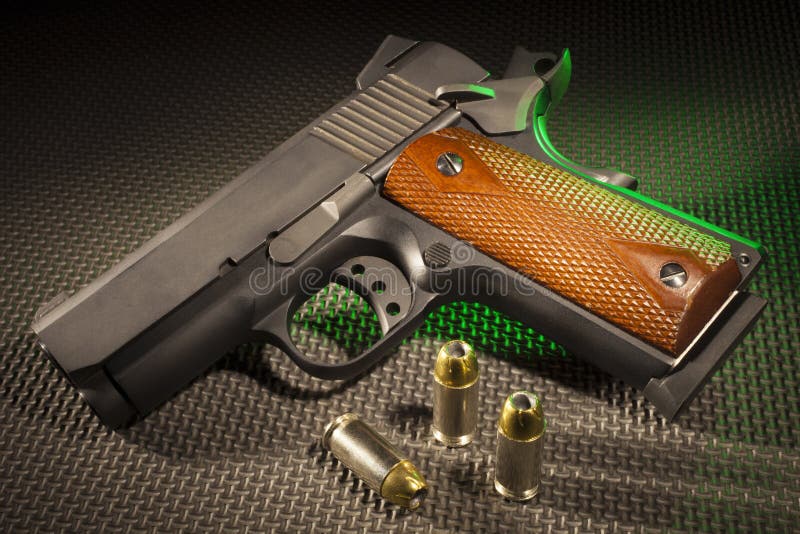 Handgun with Green Highlights Stock Image - Image of green, metal: 88221771
