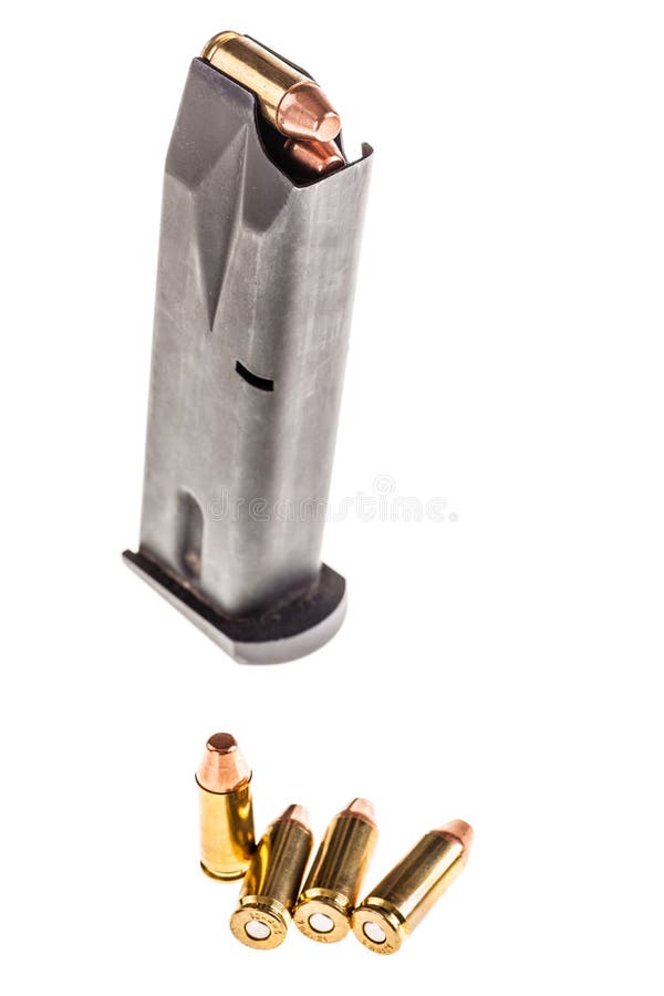 A Loaded Handgun Magazine with 40 Caliber Bullets and a Loaded Rifle ...
