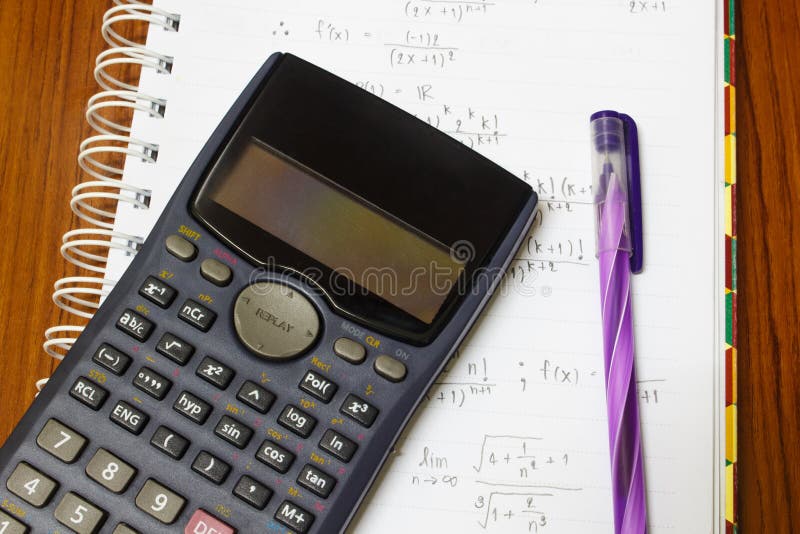 Handheld Calculator on a Sheet of Paper Stock Photo - Image of edge ...