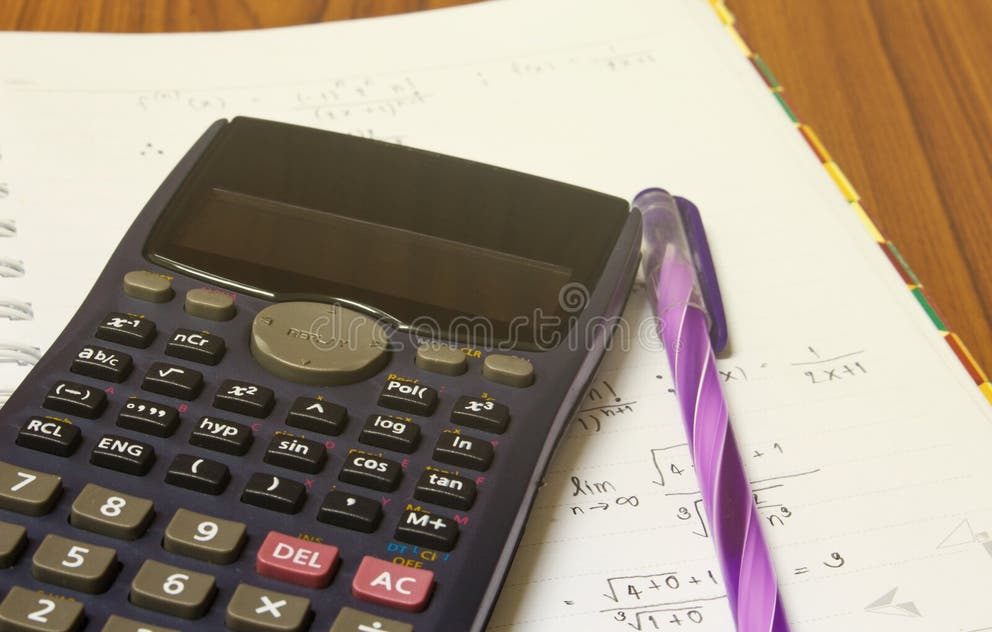 Handheld Calculator on a Sheet of Paper Stock Image - Image of calculus ...