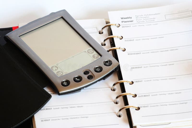 Handheld Computer and Planner Stock Photo - Image of scheduler, time ...