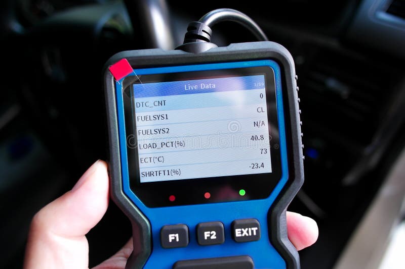 Handheld OBD2 Scanner Showing Live Engine Data with Parameters ...
