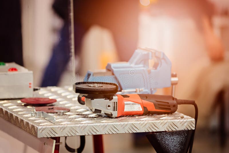 Handheld red grinding tool stock image. Image of grinding - 87691963