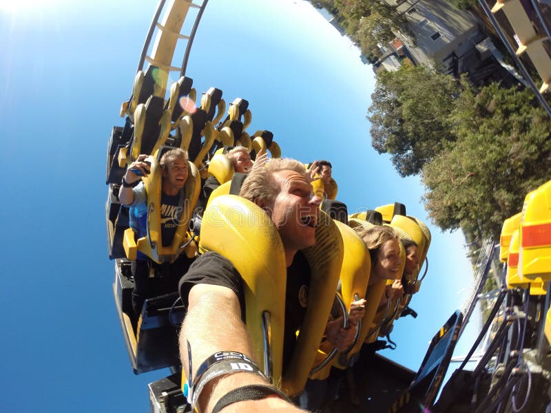 Group of Friends on a Thrilling Roller Coaster Ride Stock Image - Image ...