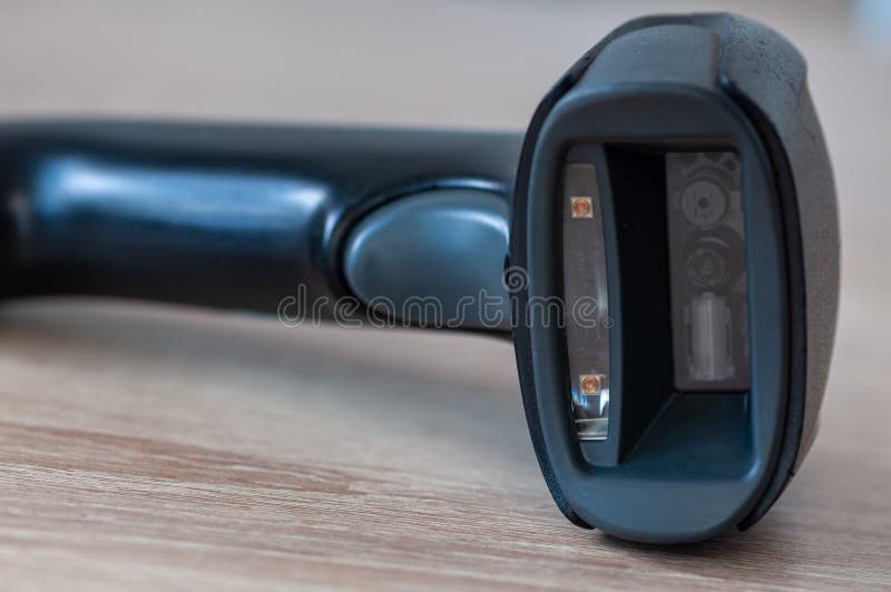 Handheld Scanner on a Wooden Table Stock Photo - Image of identity ...