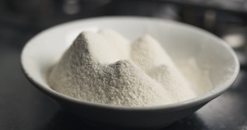 Handheld Shot of Flour in Plate on Kitchen Stock Image - Image of flour ...