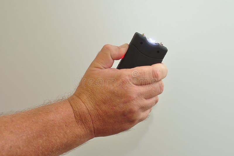 A handheld taser stock image. Image of electric, portable - 71384395