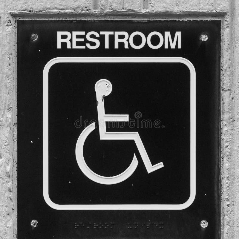 Handicap Accessible Restroom Sign on Building Stock Photo - Image of ...