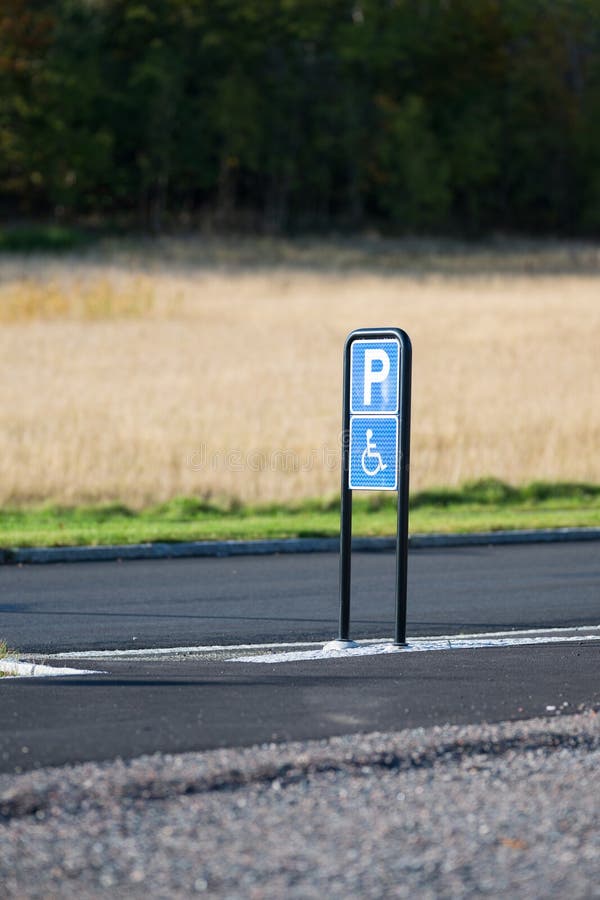Handicap Parking Sign at a Parking Lot.. Stock Image - Image of park ...
