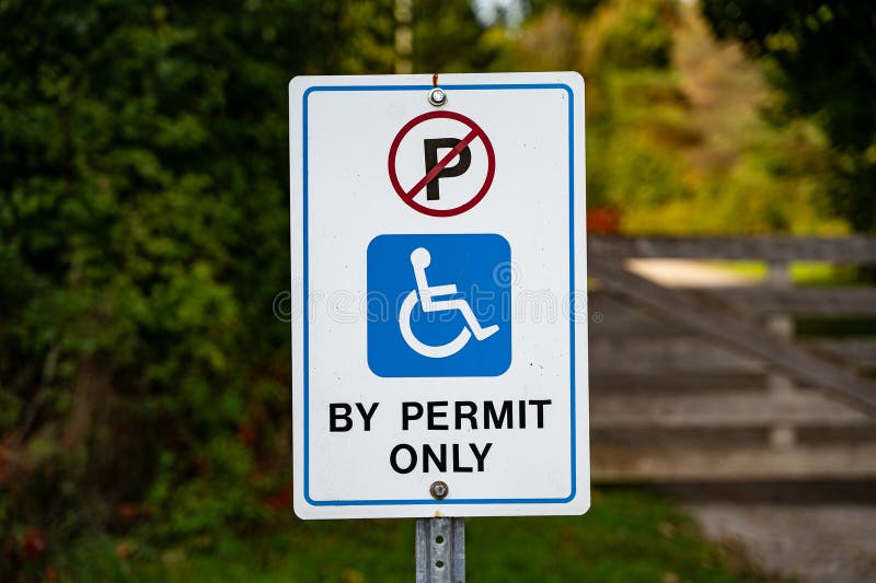 Handicapped or Accessibility by Permit only Sign in the Parking Lot ...