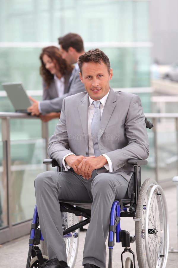 Handicapped people at work stock image. Image of business - 15745577