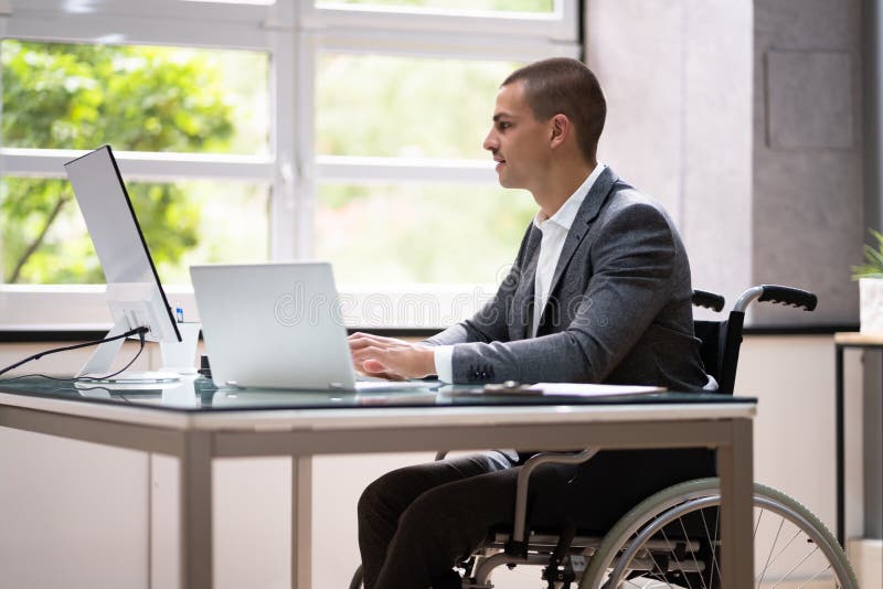 Handicapped Businessman Using Laptop Computer Stock Photo - Image of ...