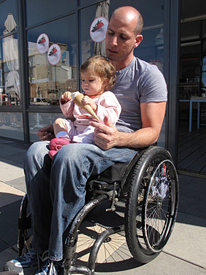 Handicapped dad with child stock image. Image of atmosphere - 19674475