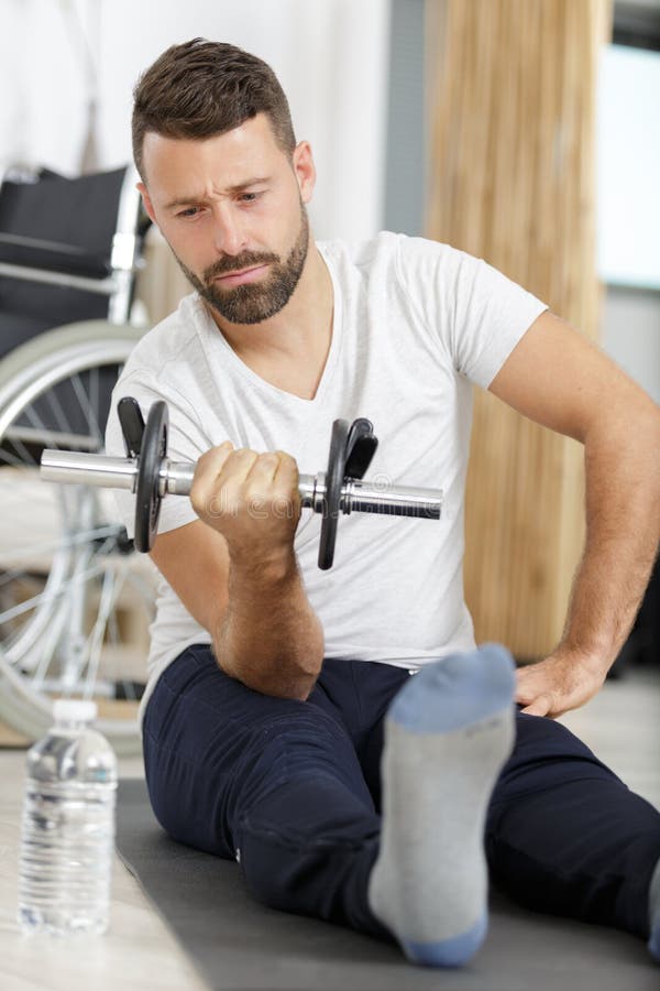 Handicapped Man Exercising with Barbell Stock Image - Image of ...