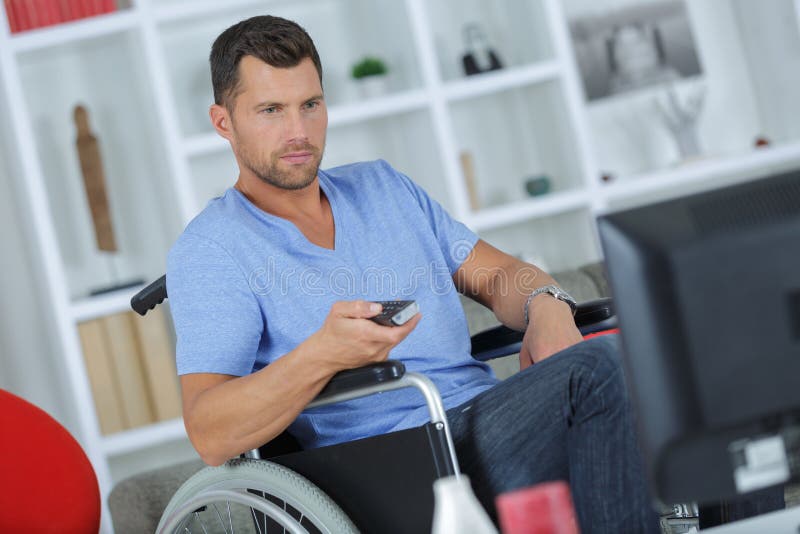 Handicapped Man Using Tv Remote Control Stock Image - Image of ...