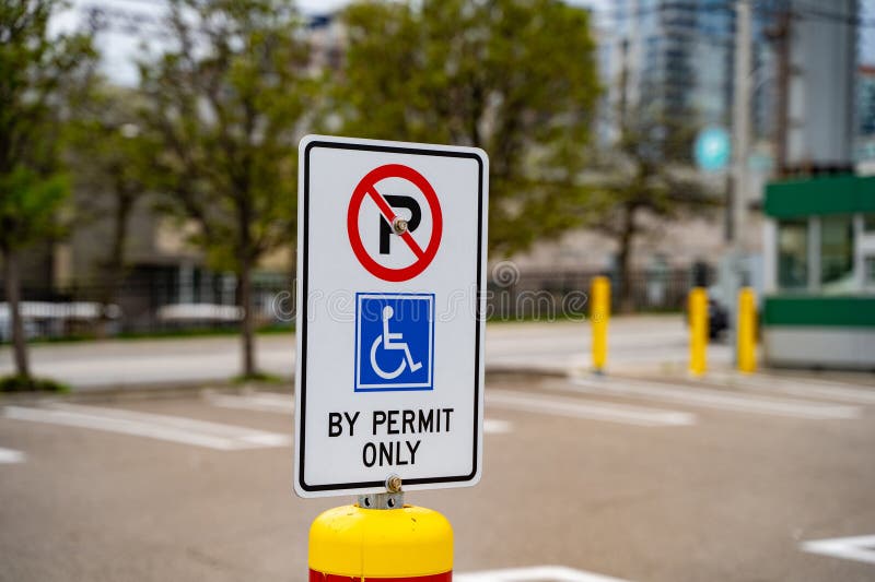 Handicapped Parking Sign in the Parking Lot Stock Photo - Image of sign ...