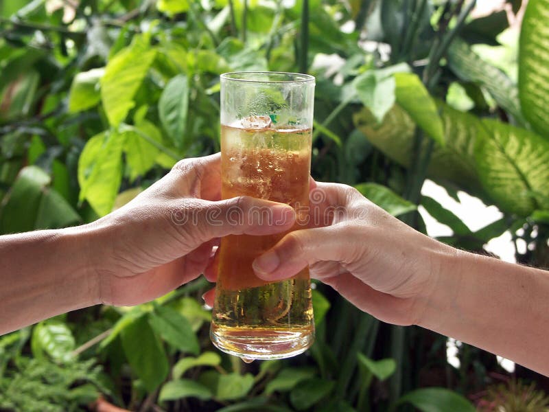 Handing beer stock image. Image of hands, handing, time - 5225085