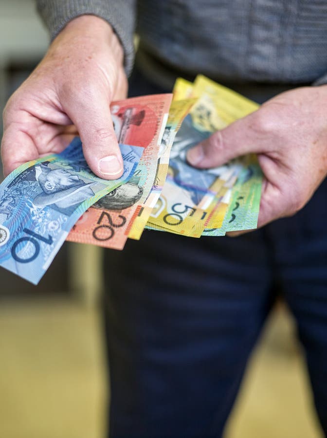 Handing over all the money stock photo. Image of fifty - 26083962