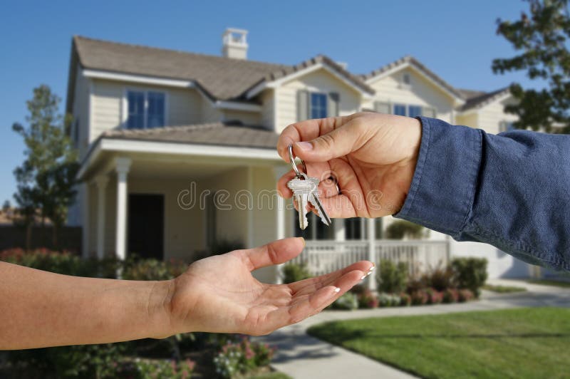 Handing Over the House Keys in Front of New Home Stock Photo - Image of ...