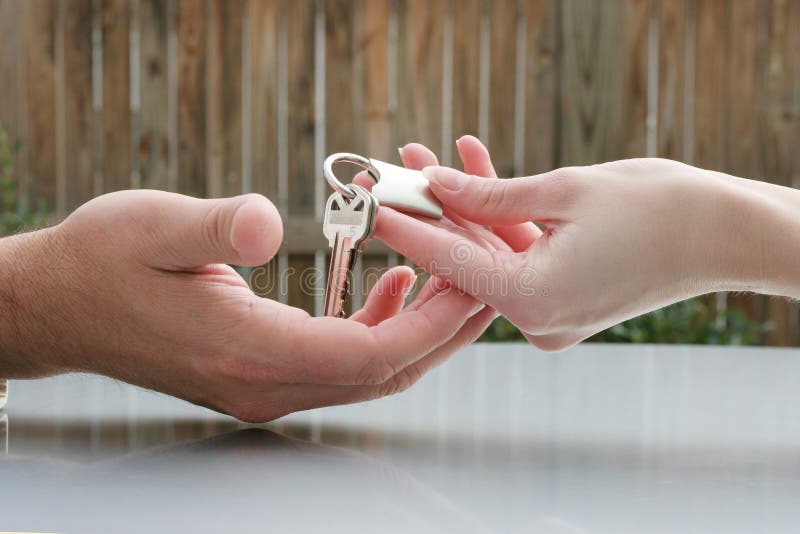 Handing over the keys stock image. Image of loan, keys - 337327