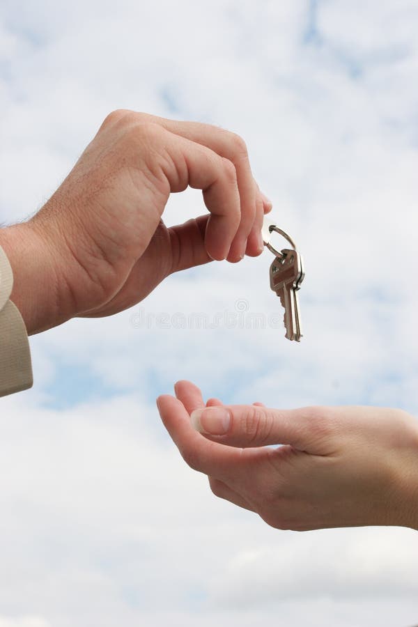 Handing over the keys stock image. Image of loan, keys - 337327