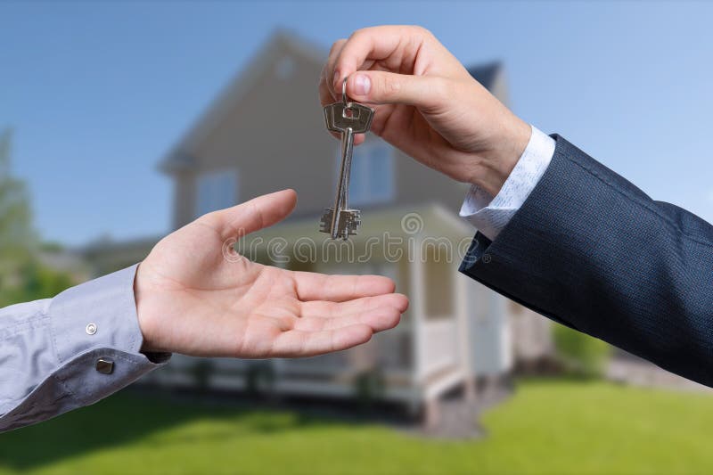 Handing Over the New House Keys with Home in the Background. Stock ...
