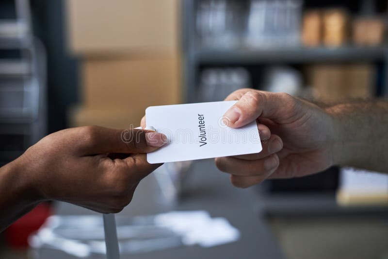Handing Volunteer Badge in Office Setting Stock Image - Image of ...