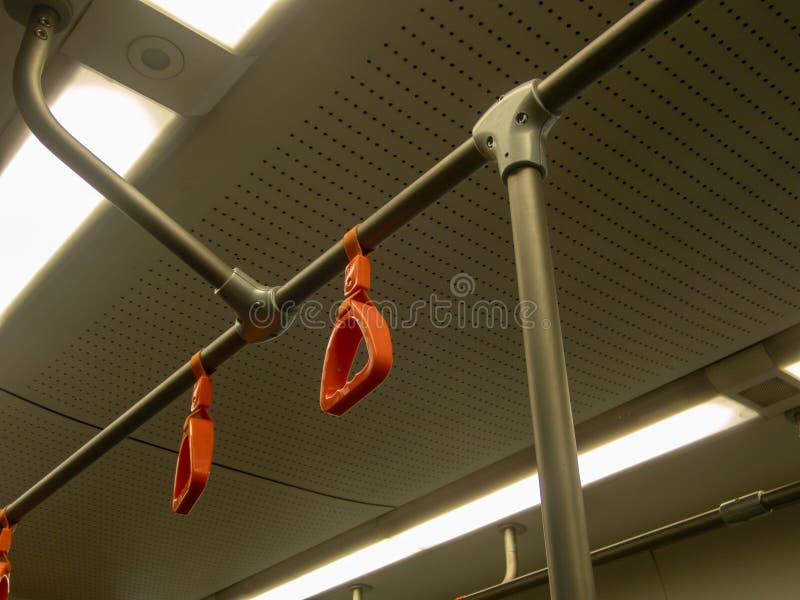 A Handle on the Ceiling of a Bus or Train. Underground Rail System or ...