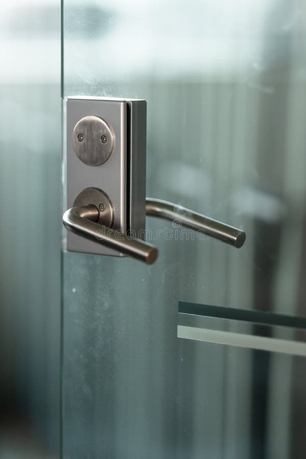 Handle and Lock of an Office Glass Door.. Stock Photo - Image of ...