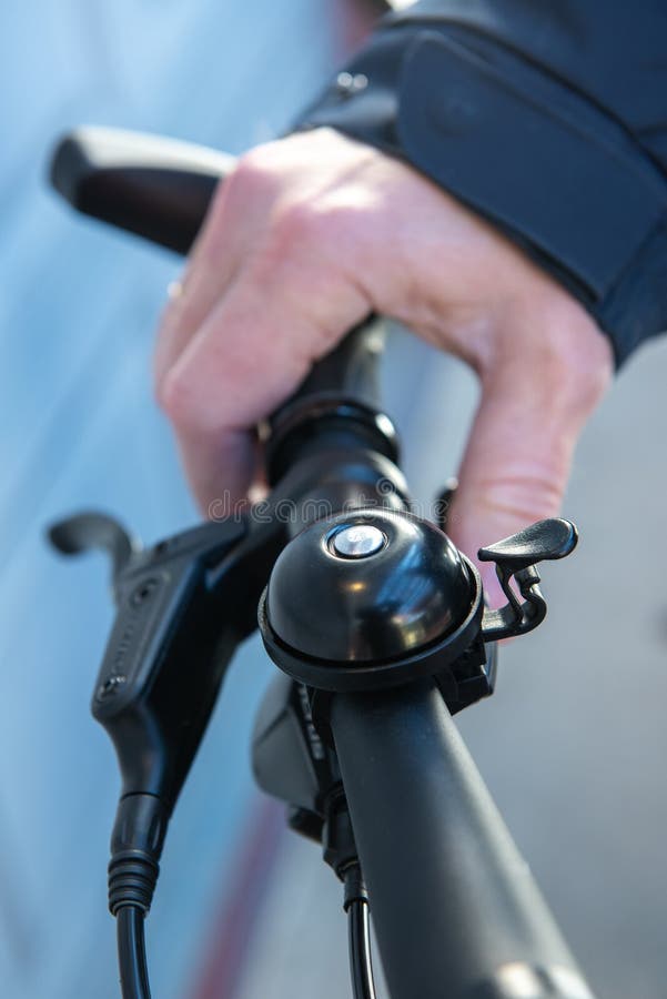 Handlebar with Bell and Grip of a E-bike Stock Photo - Image of outdoor ...