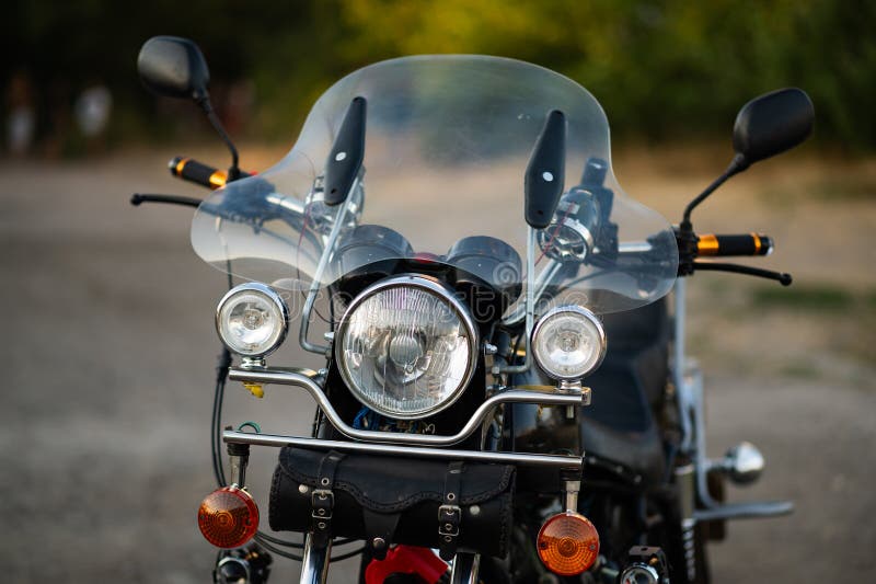 A Handlebar with a Motorcycle Headlight in Close-up. Front View Stock ...