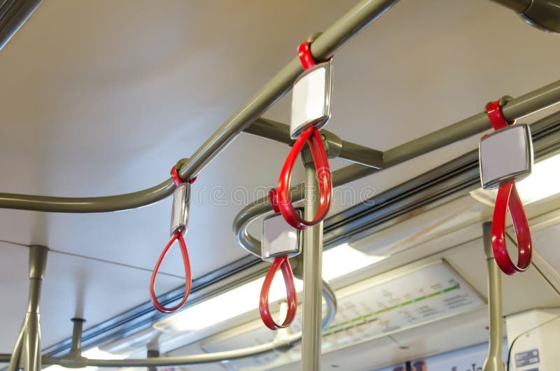 Handles in electric train stock image. Image of empty - 51972665