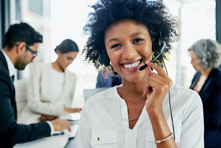 Handling Every Customer Query with a Smile. Portrait of a Friendly ...