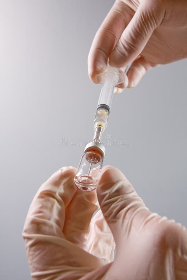 Handling injections stock photo. Image of needle, hospital - 5384462