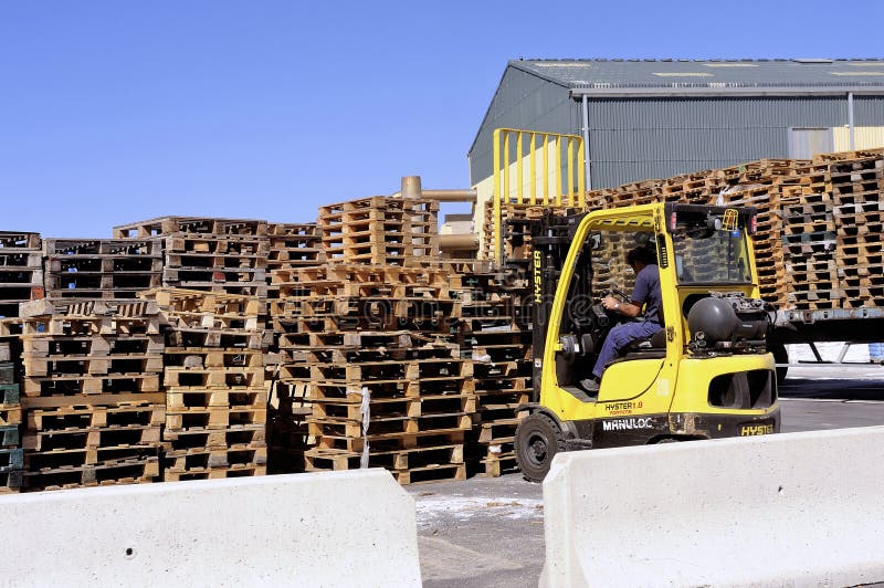 Handling and Storage of Pallets Editorial Stock Image - Image of ...