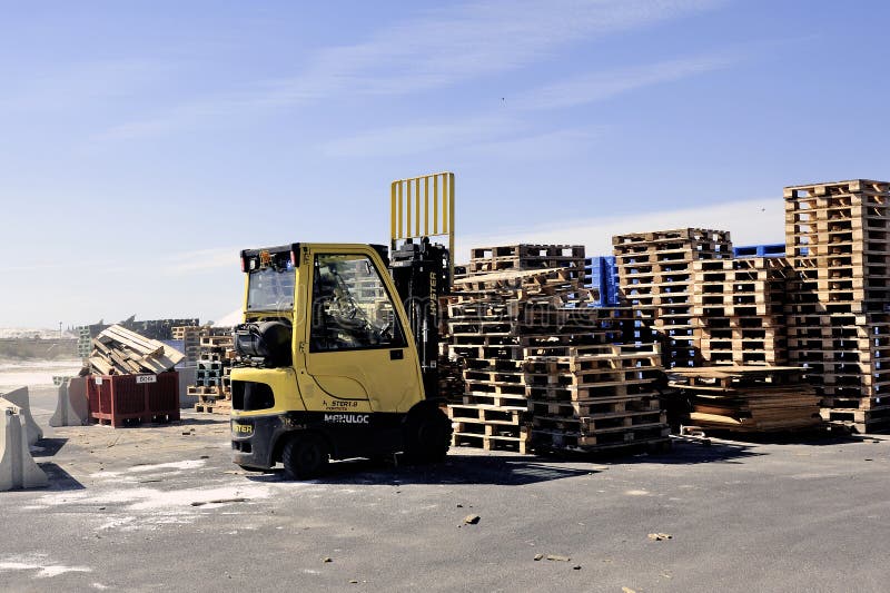 Handling and Storage of Pallets Editorial Photo - Image of storage ...