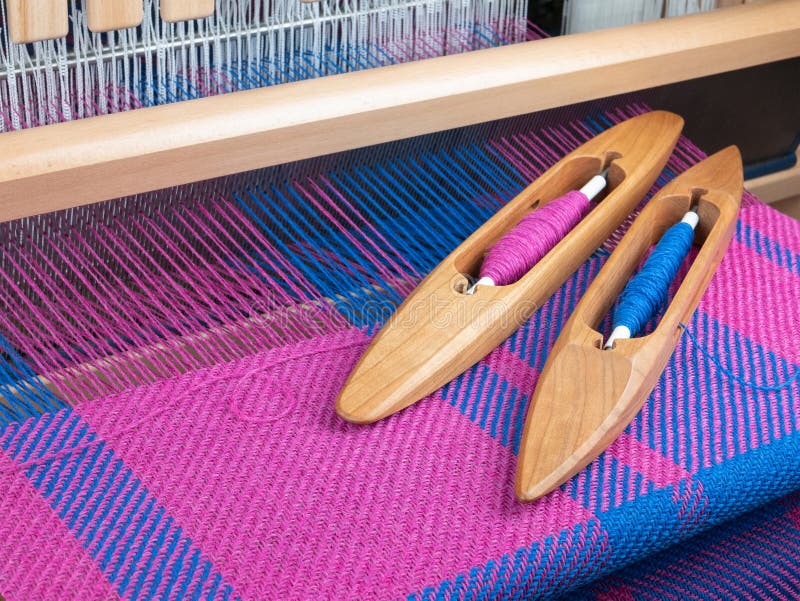Handloom and Shuttles with Threads. Combination of Pink and Blue Colors ...