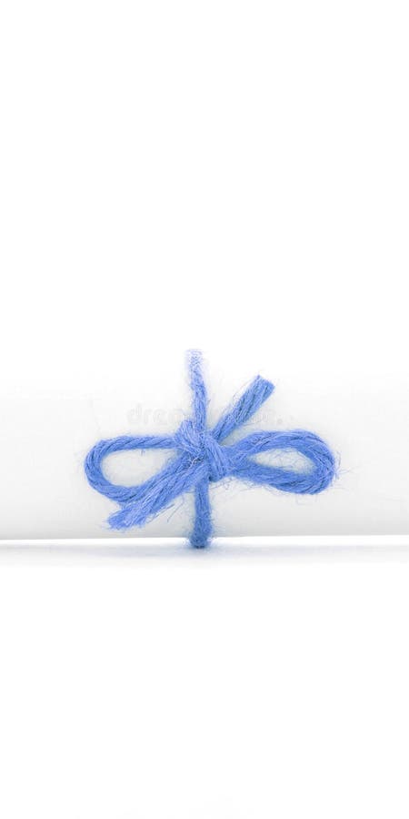 Handmade Blue String Bow Tied on White Paper Tube Isolated Stock Photo ...