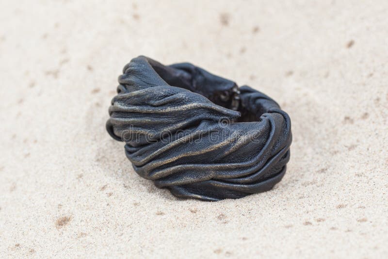 Handmade Bracelet with Leather on Sand Stock Photo - Image of designer ...