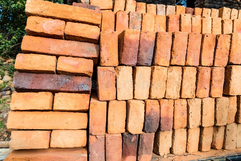 Handmade bricks stock image. Image of construction, labor - 138040277