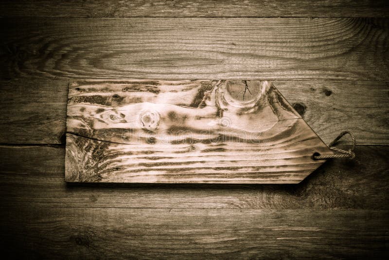 Handmade Burned Cutting Board on a Wooden Rustic Texture for Background ...