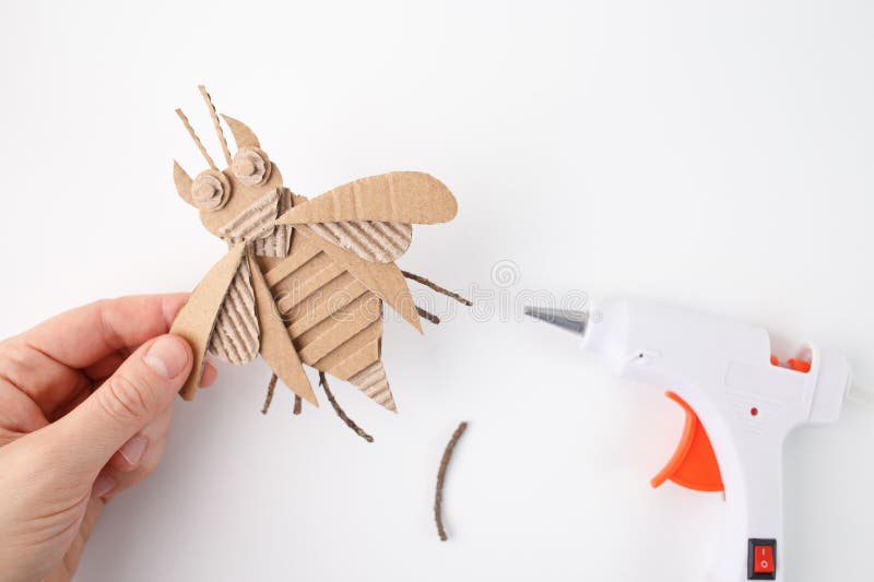 Handmade Cardboard Insect Crafts with Crafting Tools on White ...
