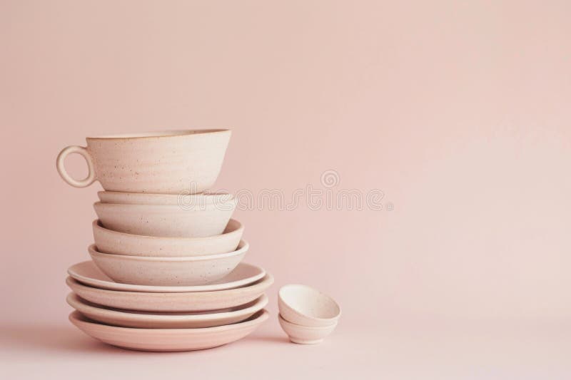 Handmade Ceramic Dinnerware Stack on Pastel Pink Background - Design ...