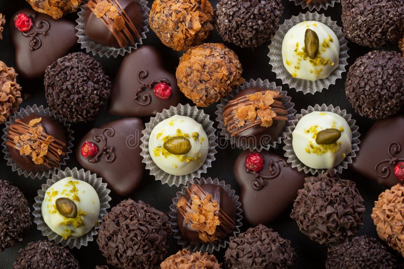 Handmade chocolates stock image. Image of assorti, sugar - 26666333
